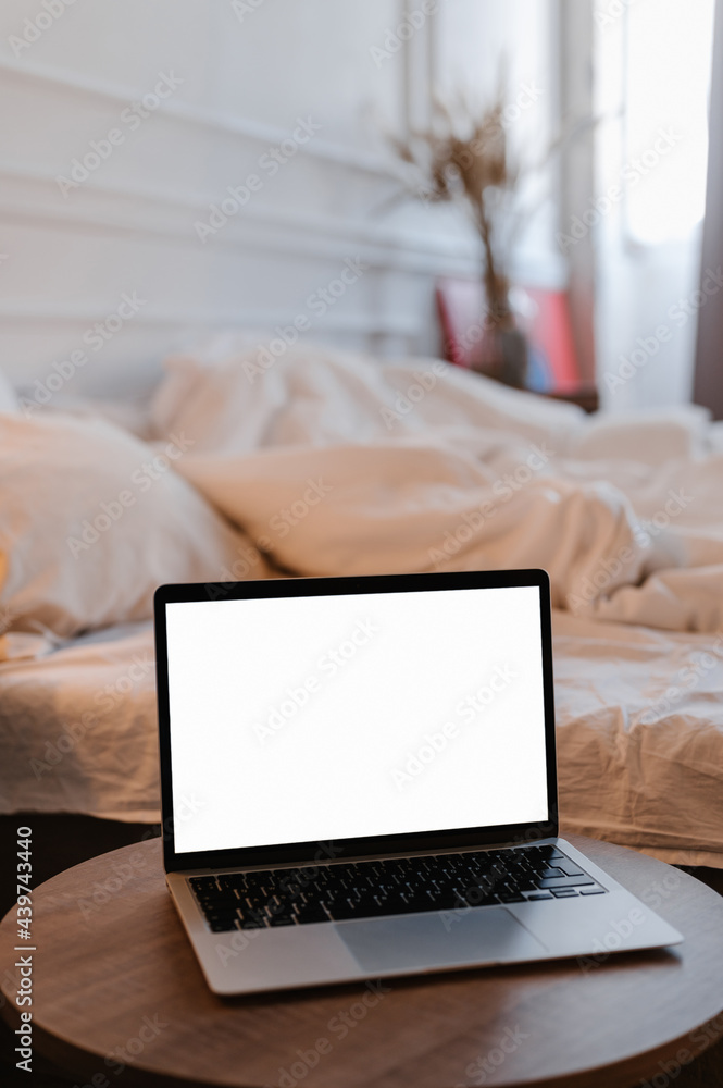 Laptop with empty screen in bedroom Stock Photo | Adobe Stock