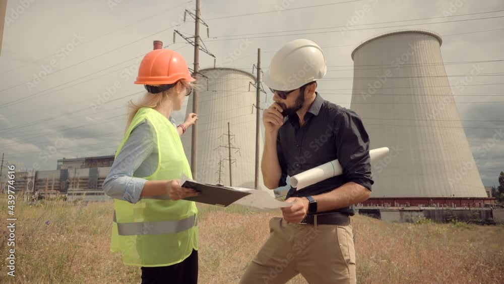 Power Engineer On Electricity Towers High Voltage Pylons.Technician And ...
