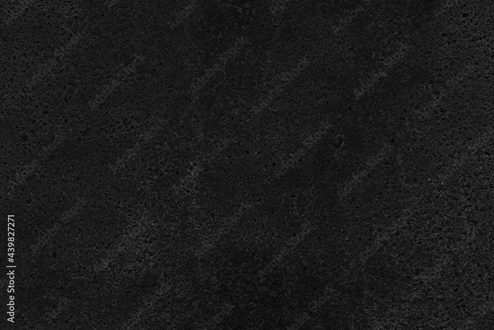 Black exposed aggregate concrete texture. Dark rough cement with pebble ...