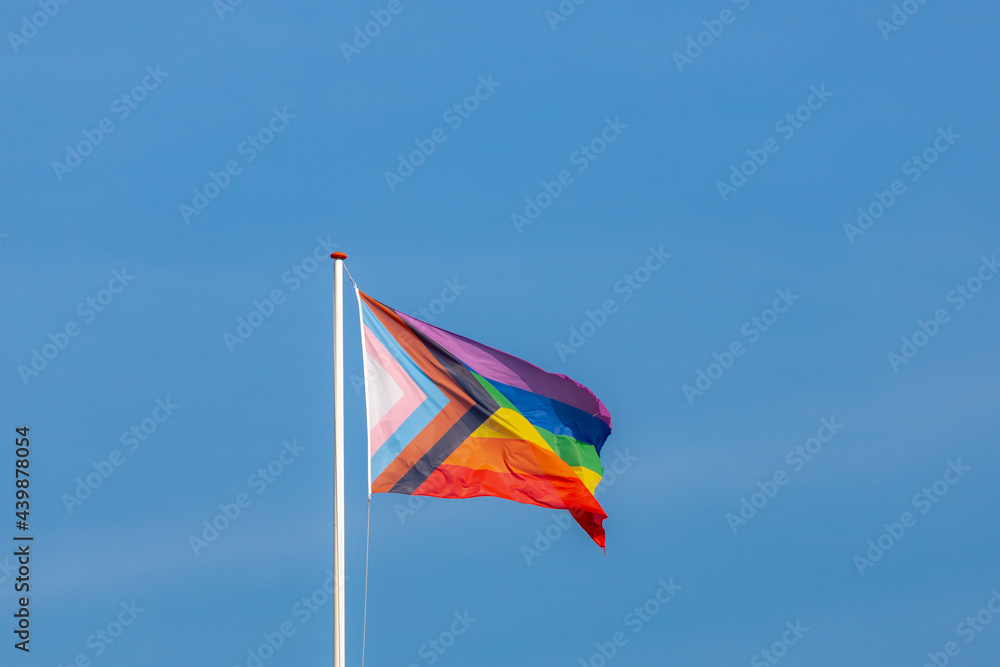 Worldwide LGBTQ community concept with progress pride flag (new design ...