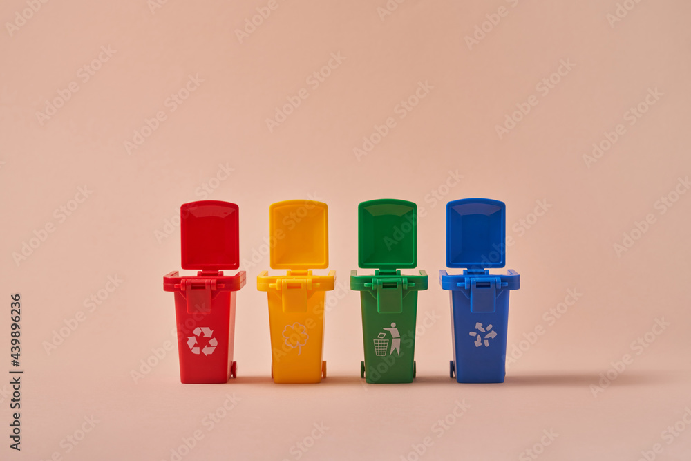 Small empty trash cans for recycling Stock Photo | Adobe Stock