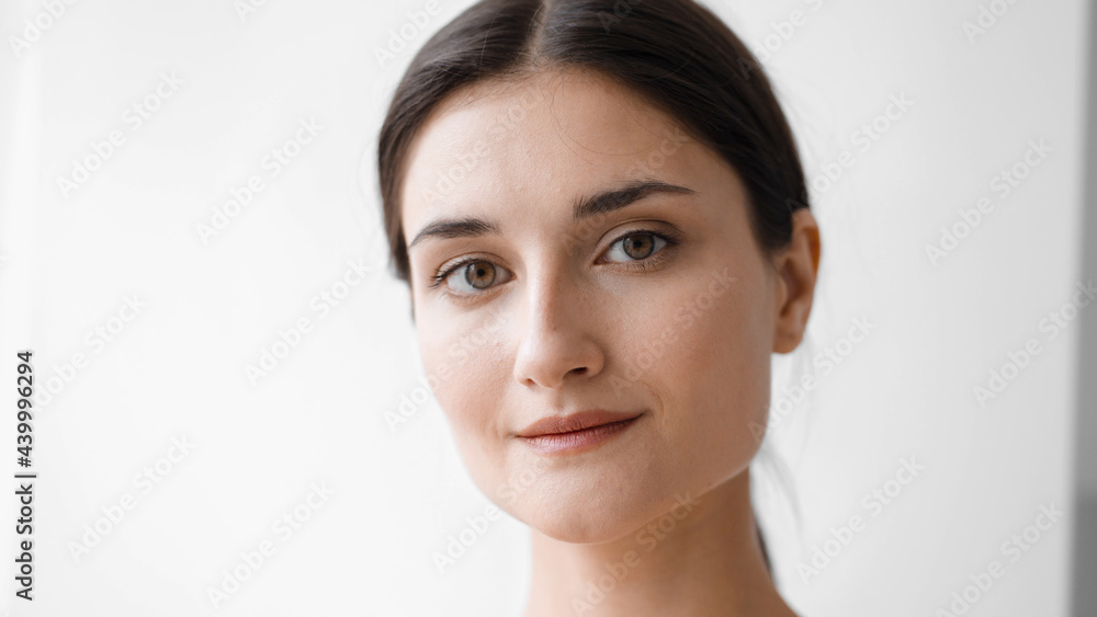 Beautiful woman face close up brunette natural make up happy smile ...