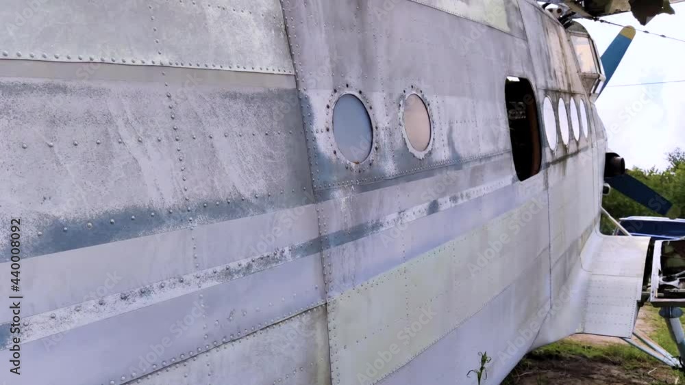 A close-up of an old wrecked passenger plane that has been ...
