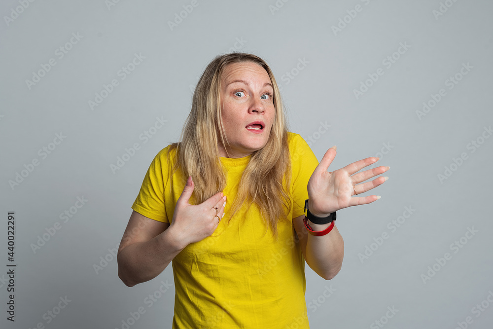 I dont know. Confused mature woman doubting and shrugging shoulders in ...