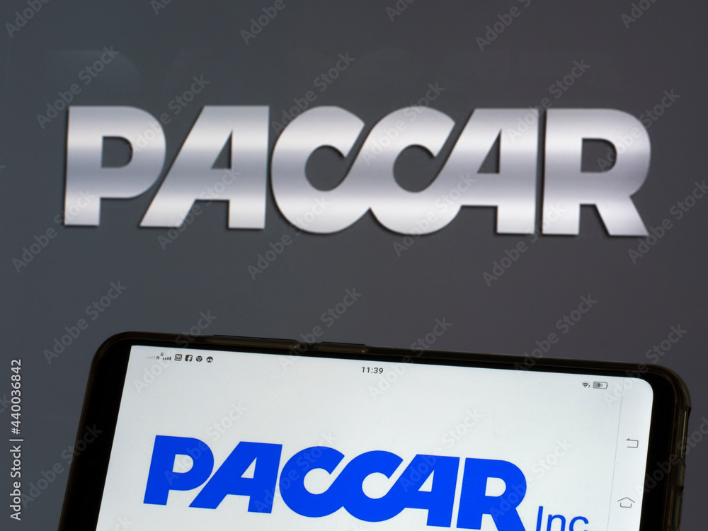 In this photo illustration, a Paccar Inc. logo seen displayed on a smartphone. Stock-Foto ...