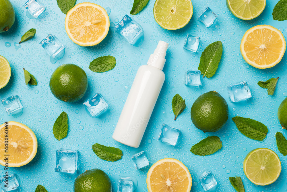 Top view photo of white spray bottle without label in the middle mint ...