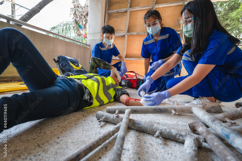Physical injury at work of construction worker. Emergency medical teams ...