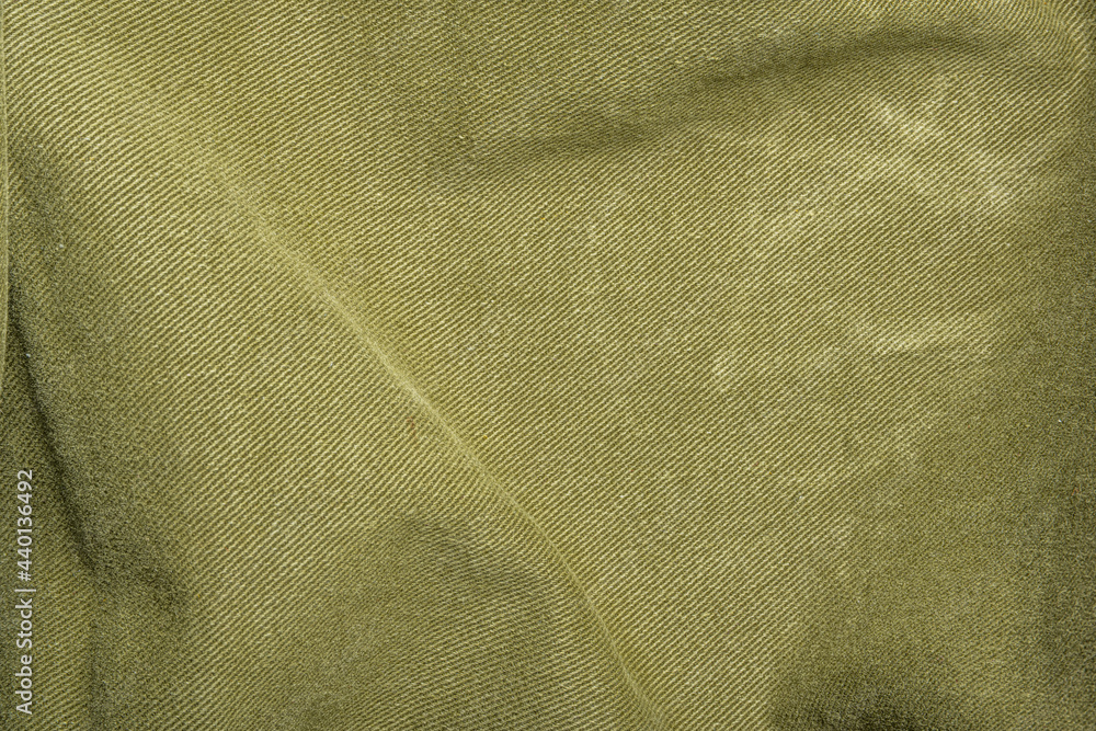 Deep moss green denim fabric with texture and worn feel for design ...