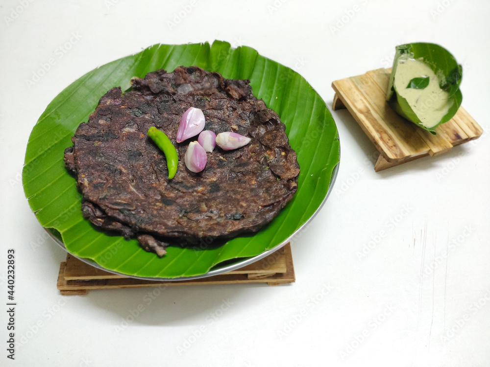 Protein rich Ragi roti made from Finger millet placed in a banana leaf ...
