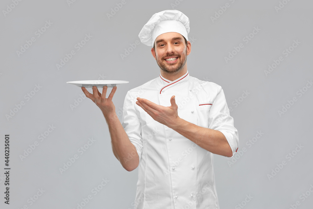 cooking, culinary and people concept - happy smiling male chef in toque ...