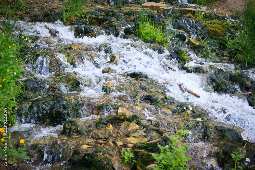 Slovenian Keys waterfall, illuminated source, living water out of the ...
