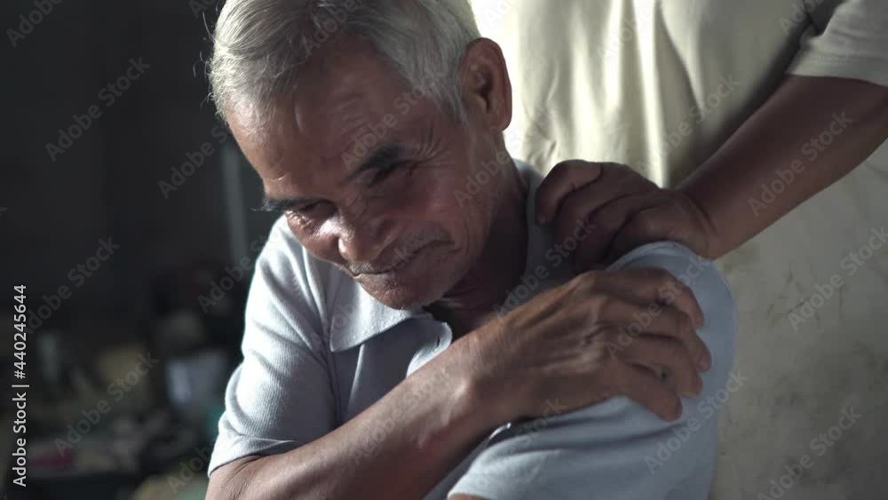 Vídeo do Stock: Footage B roll of Older man shoulder pain. Older man ...