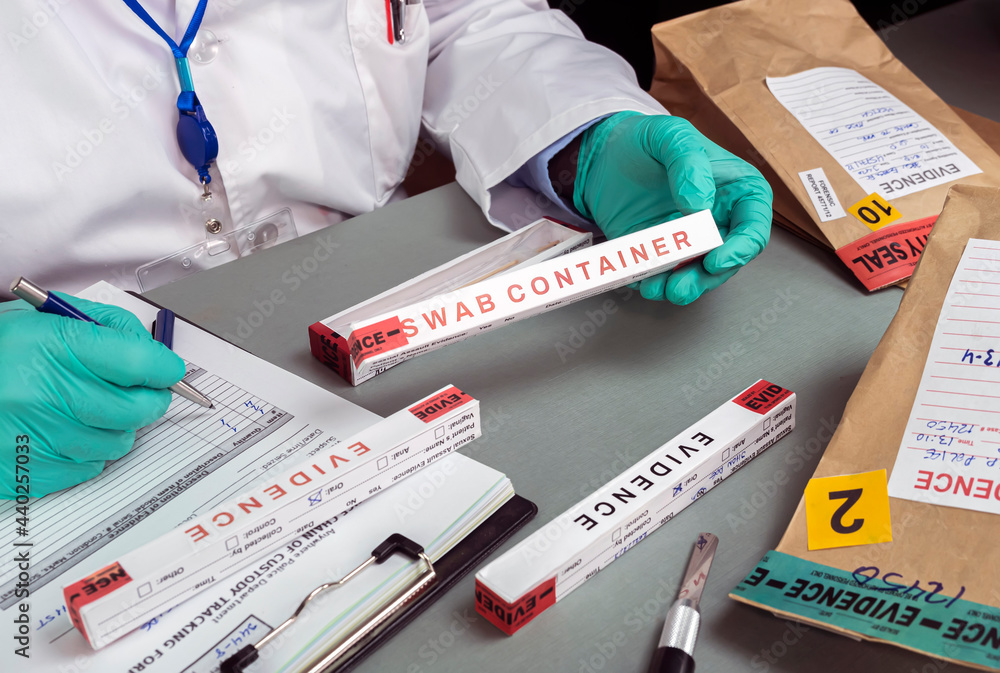 police scientist takes data from evidence box in crime lab, conceptual ...