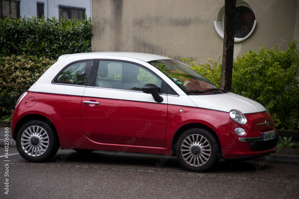 Mulhouse - France - 13 April 2021 - Profile view of red and white Fiat ...