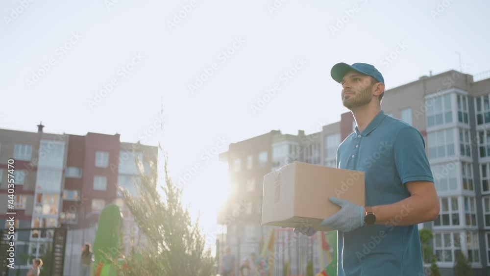 Blue delivery man send a package to customer on before deliver cargo ...