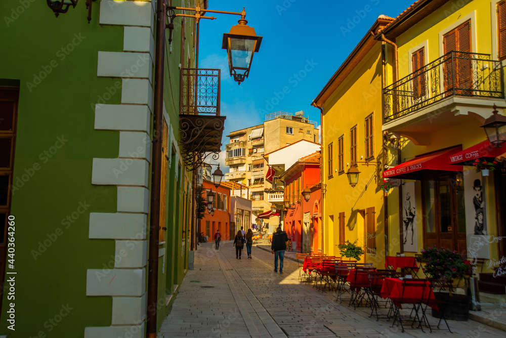 VLORA-VLORE, ALBANIA: Historical multi-colored buildings on the street ...