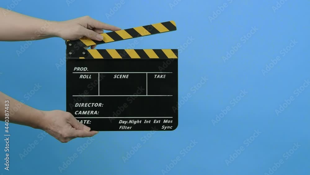 Film Slate or Movie Clapperboard with Blue Green screen background ...