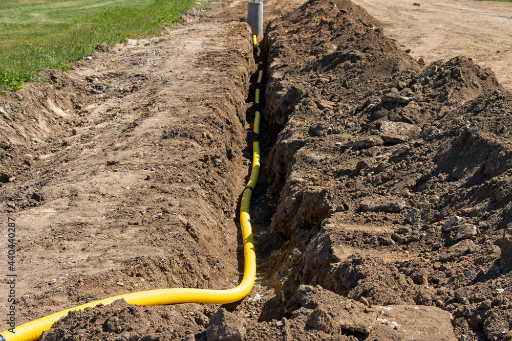 Street Light Electric Cable installation in the trench. Stock Photo ...