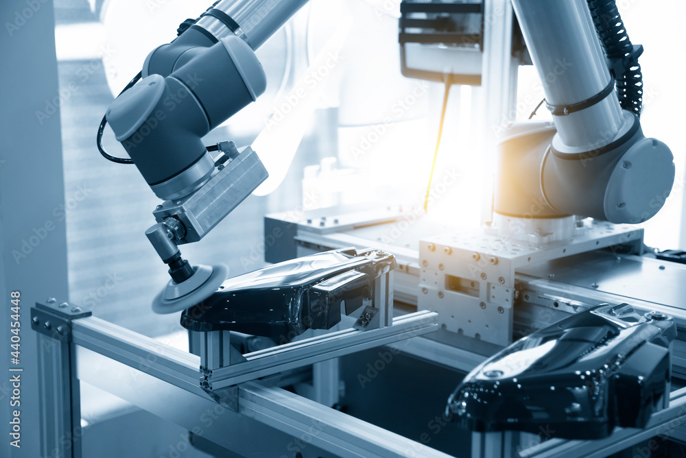 The robotic arm polishing the automotive painting parts .The hi ...