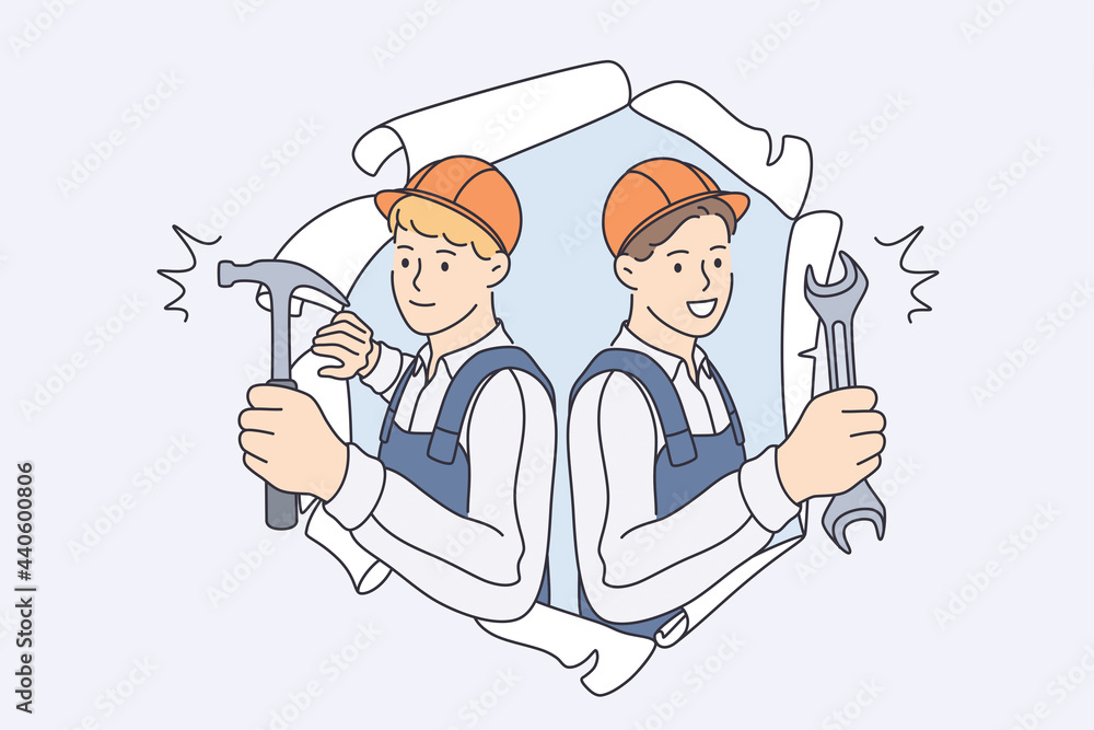 Repairmen during construction work concept. Young smiling men workers ...