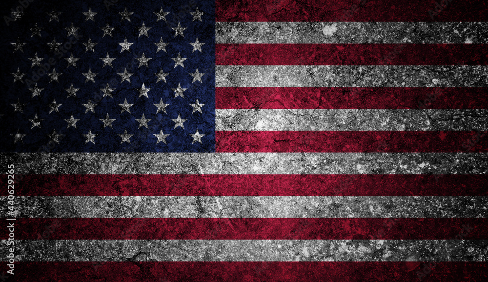 National flag of USA depicting in paint colors on an old stone wall ...