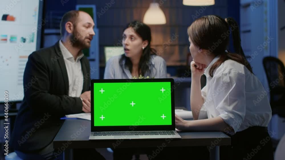 Mock up green screen chroma key with isolated display standing on table ...