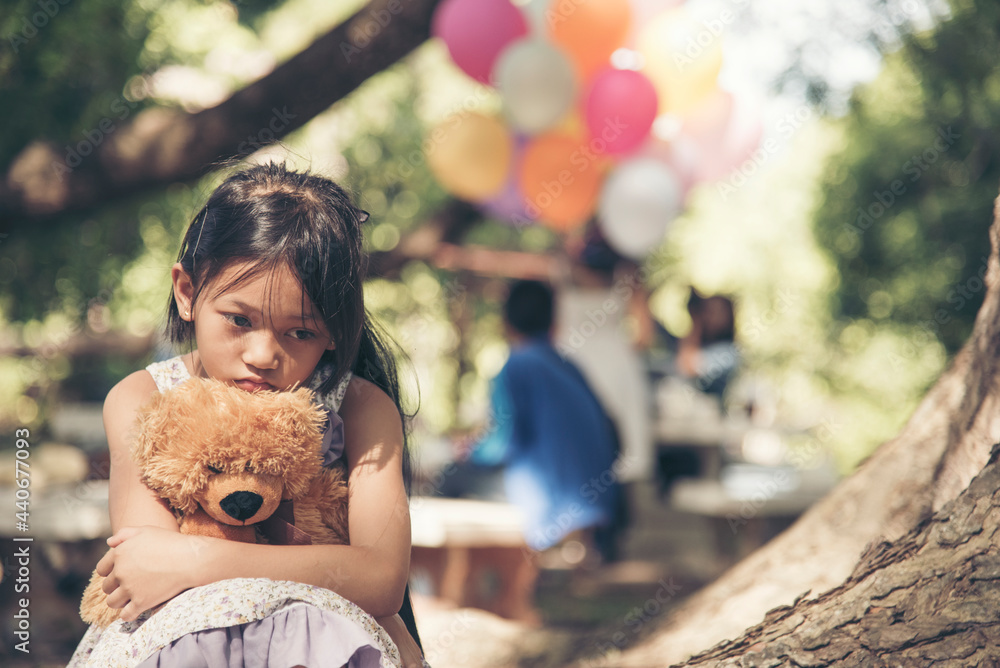 Sad Child Playing Alone