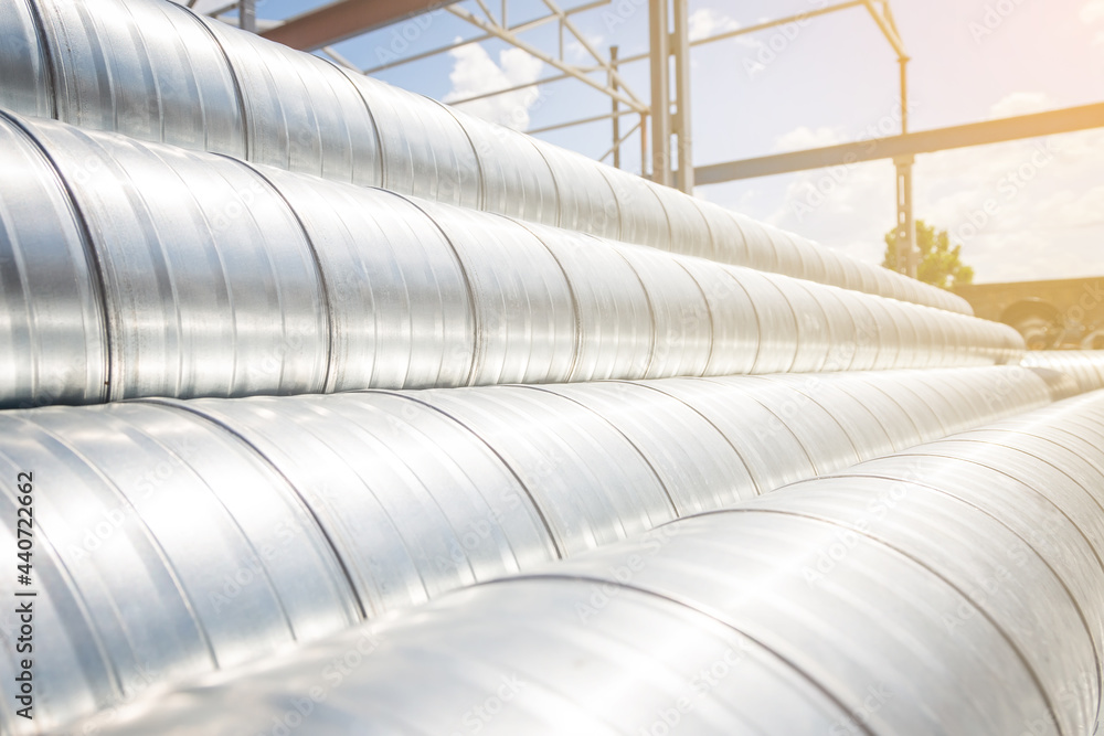 Ventilation pipe warehouse. Steel pipes, parts for the construction of ...
