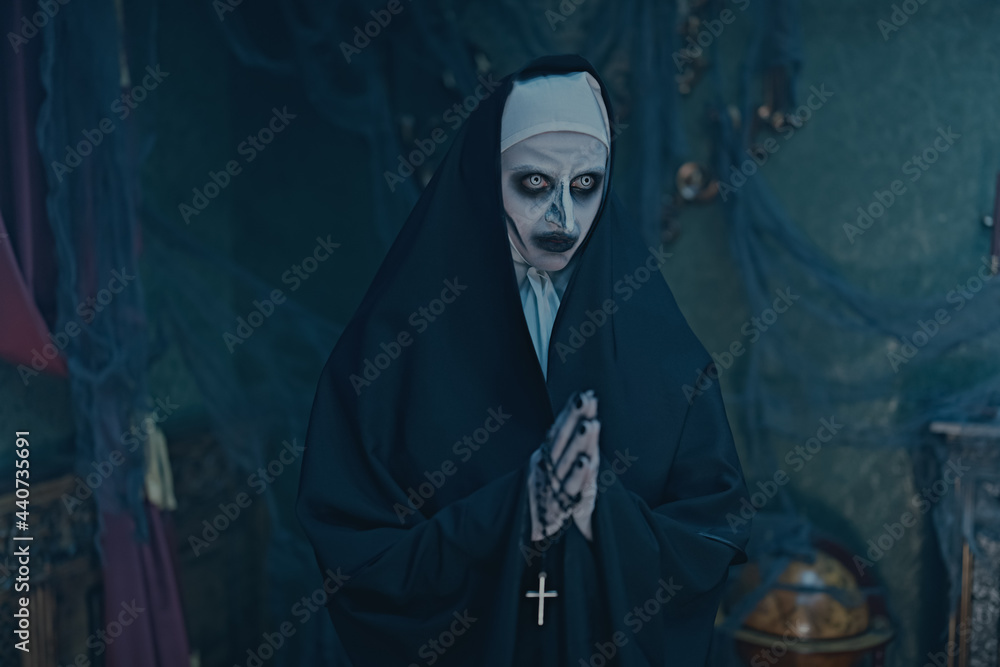 gothic nun in chapel Stock Photo | Adobe Stock