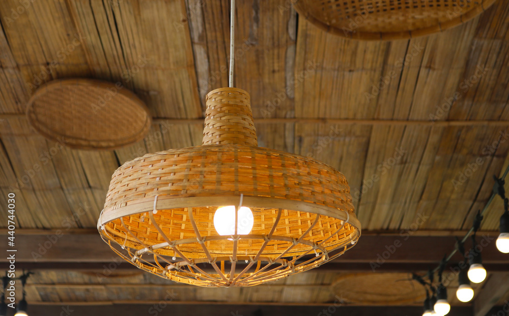 Wooden pendant lamp tropical and vintage style installed on bamboo ...