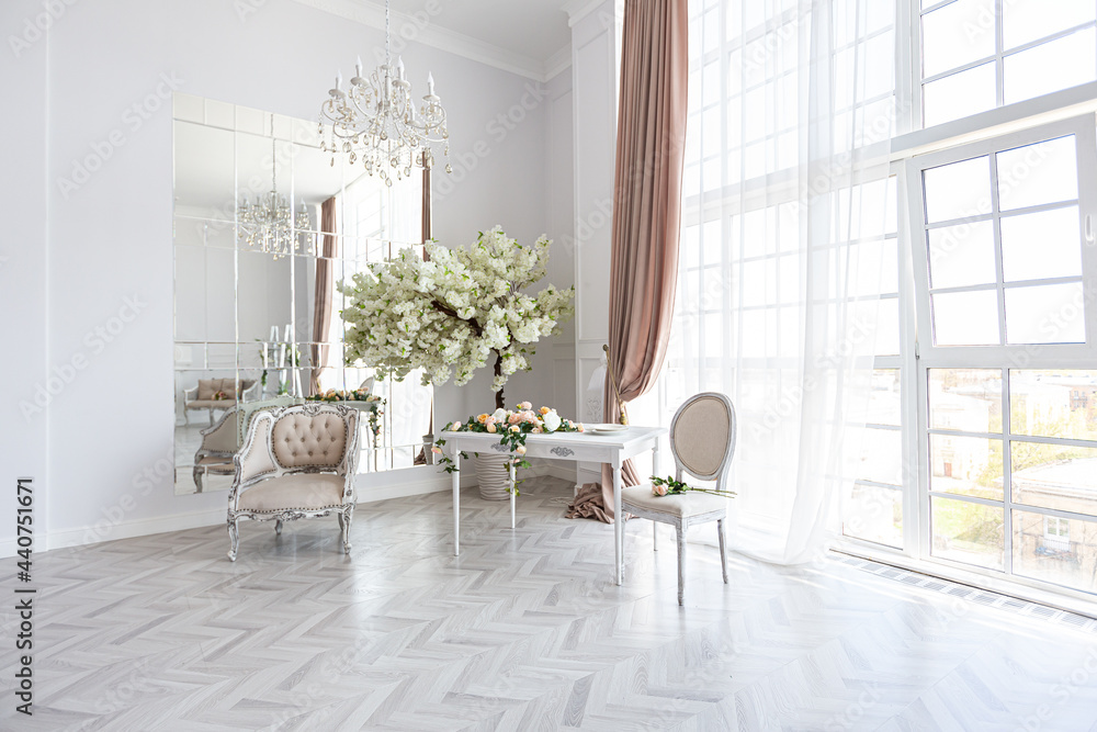 luxurious bright spacious guest room with beautiful chic furniture a ...