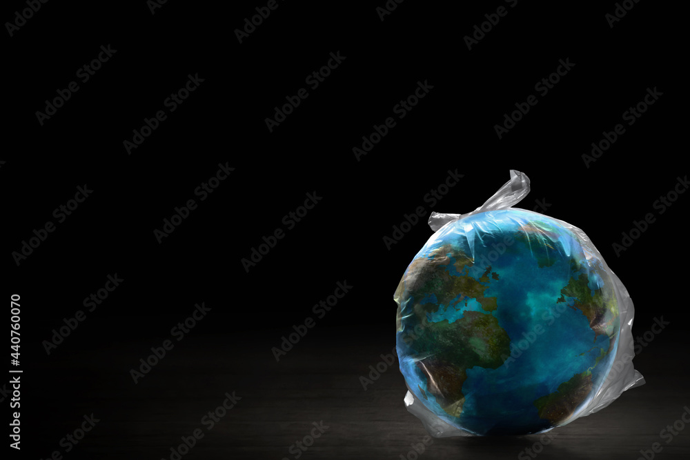 Planet earth in a plastic Stock Photo | Adobe Stock