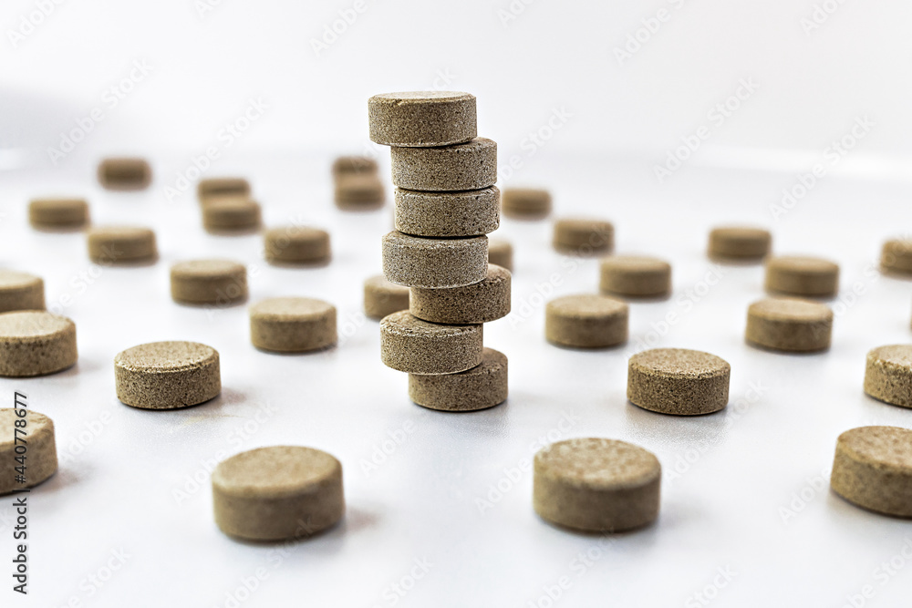 selective focus photo of DGL (licorice root extract) chewable tablets ...
