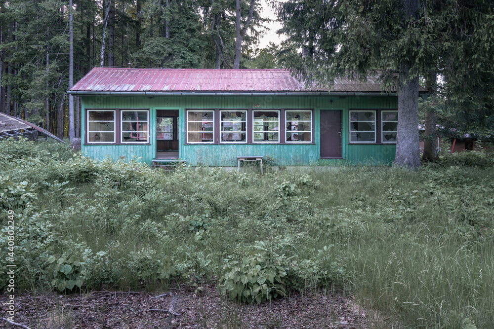 Old, abandoned wooden house with windows broken. Deserted building ...