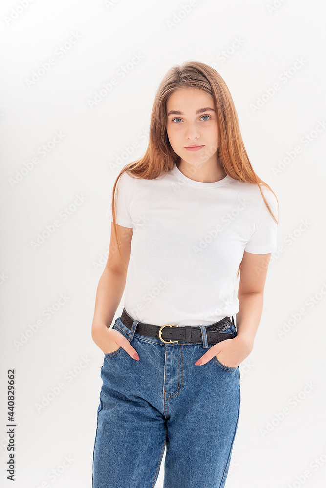 portrait of young attractive caucasian woman with long hair in t-shirt ...