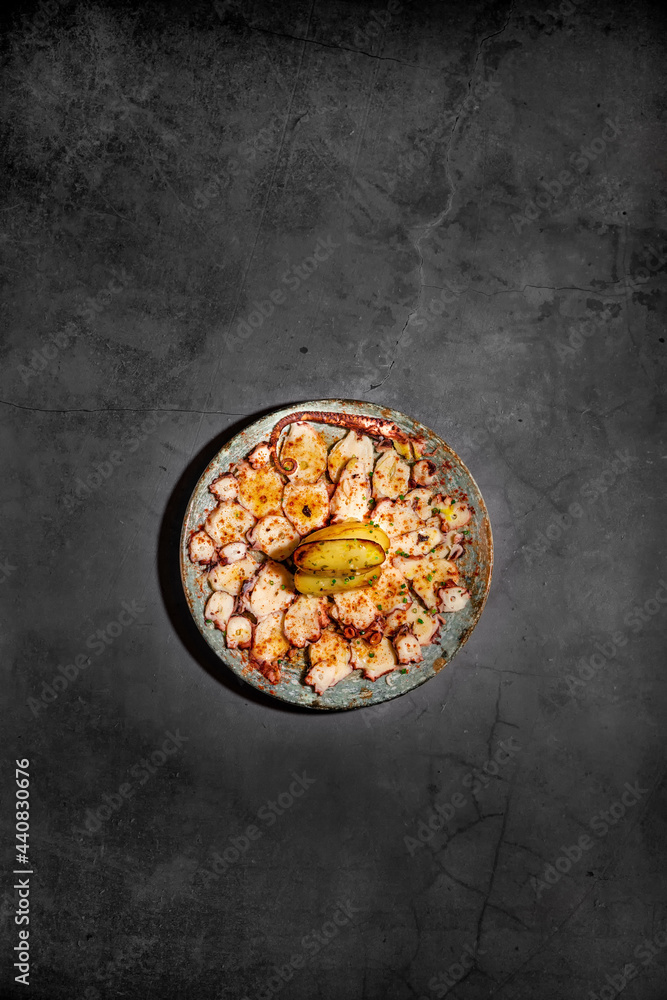 Flat lay food photography of sliced octopus beautiful decorated. Top ...