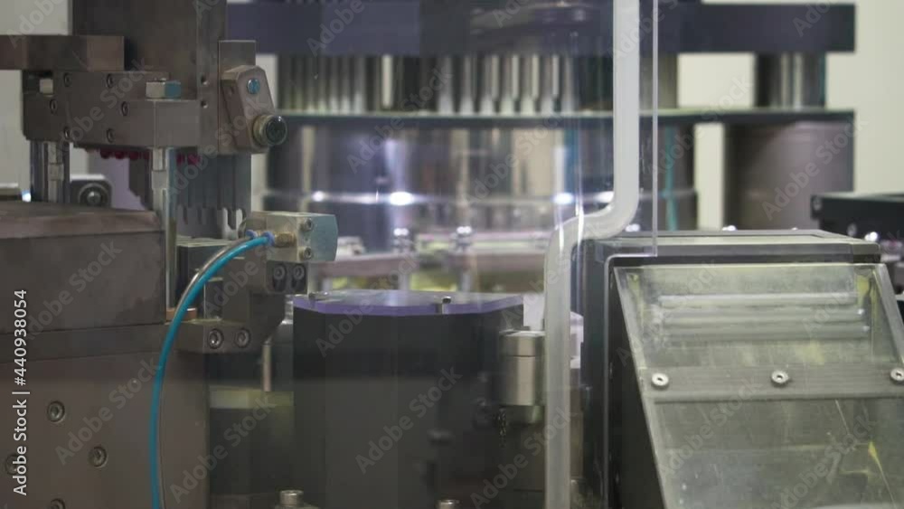 The process of the Medical encapsulation machine working. Capsules are ...