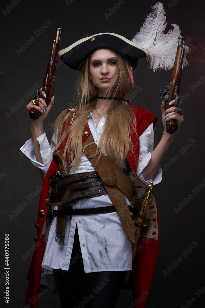 Woman bandit with tricorn in suit and dual handguns Stock Photo | Adobe ...