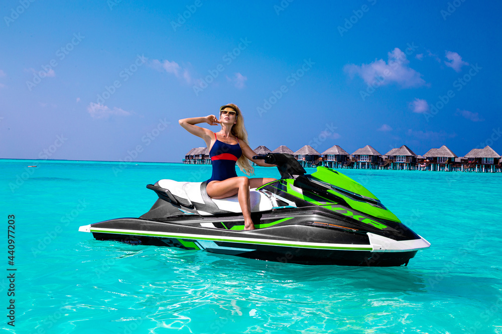 Sexy tanned woman bikini model at Maldives tropical sand beach. Glamour ...