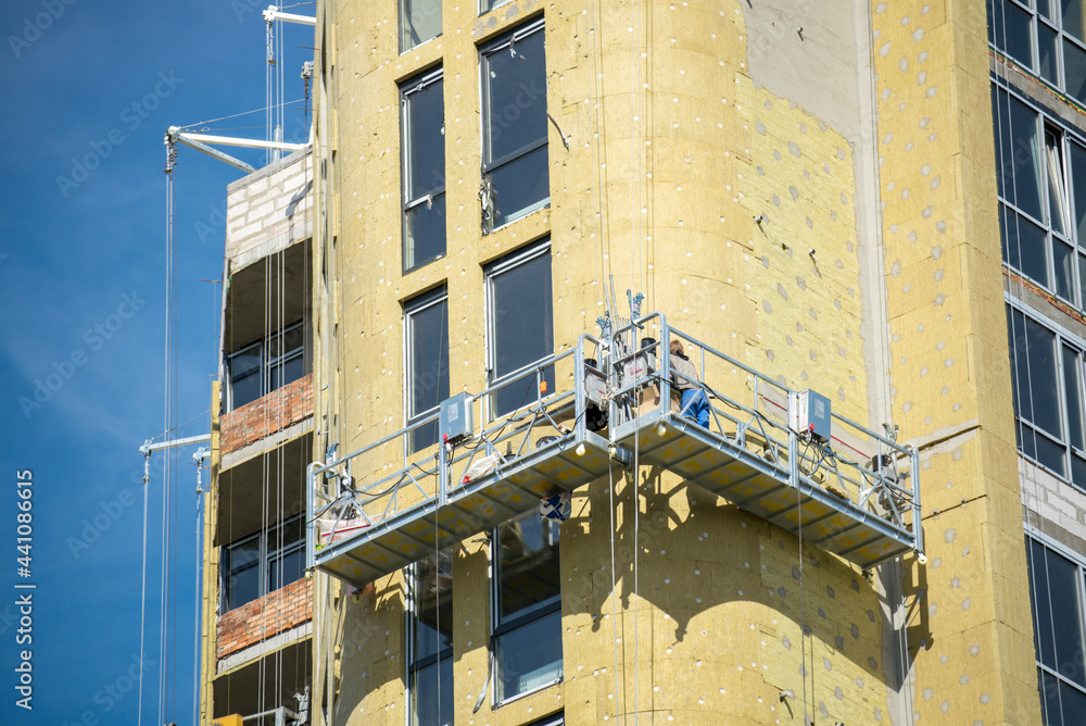 Building external wall thermal insulation with mineral wool. Exterior ...