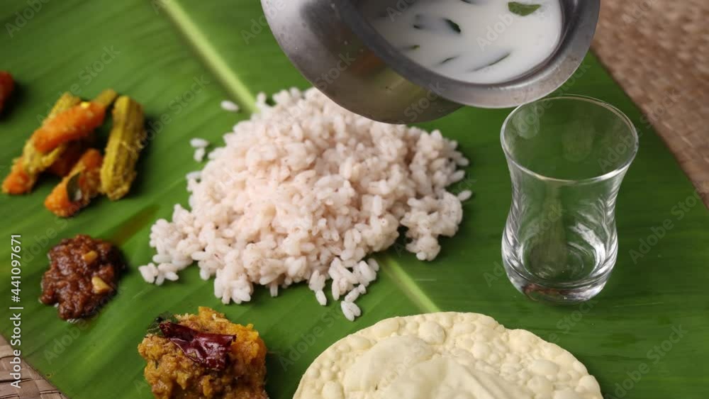 Serving buttermilk Onam Sadhya Matta rice Kerala Red rice Palakkadan ...