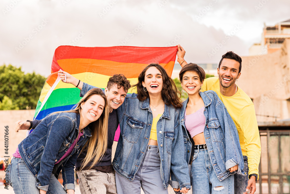 Multiethnic diversity LGBTQ group with rainbow flag. Multiracial ...