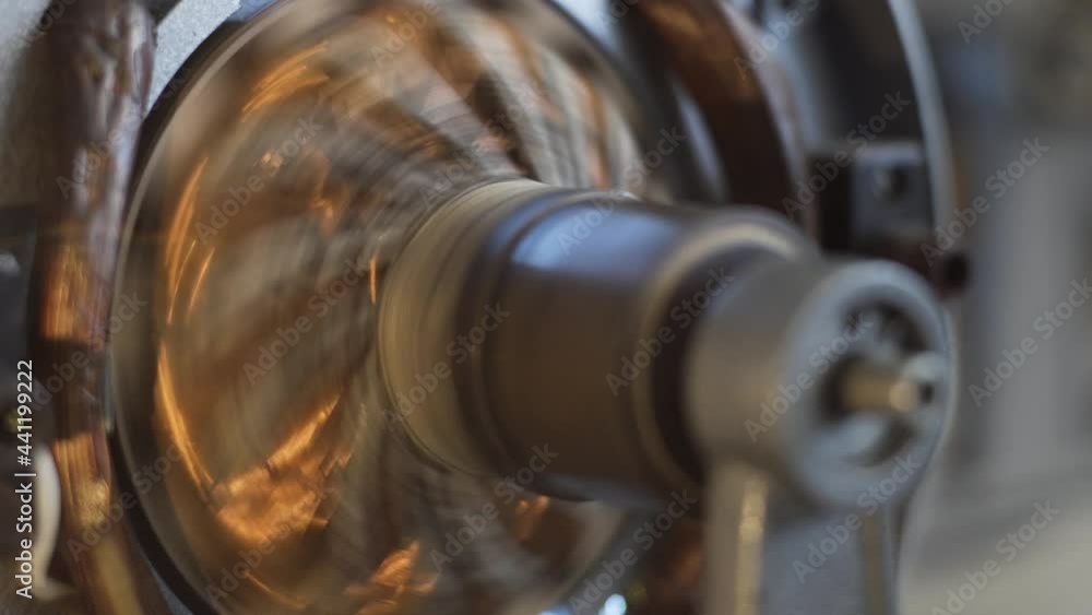 The mechanism of an induction motor inside in motion in a disassembled ...