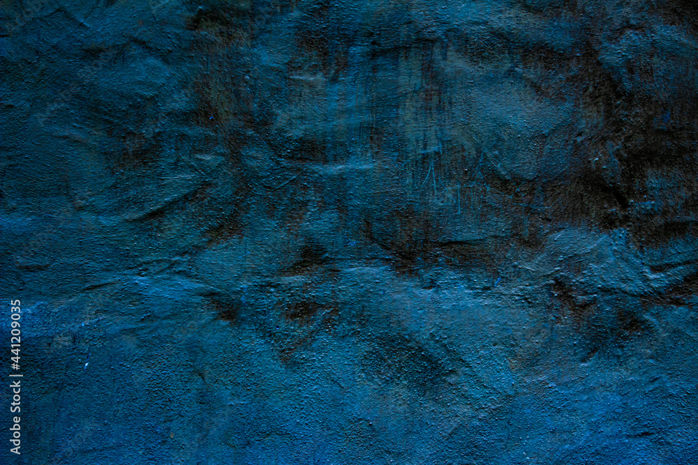 Blue and black colored abstract wall background with textures of ...