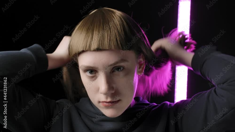 Video of young woman taking off wig Stock Video | Adobe Stock