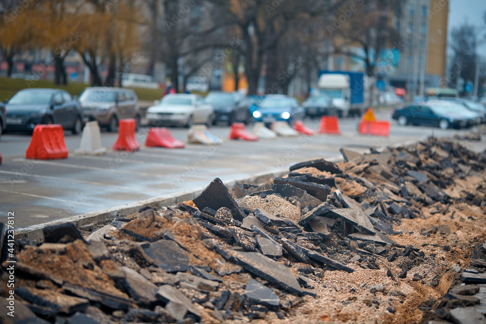 Road construction, broken asphalt on pedestrian zone in the city street ...