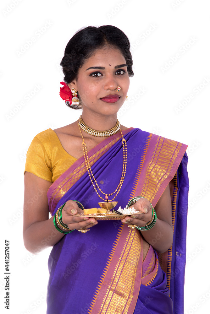 Indian woman performing worship, portrait of a beautiful young lady ...