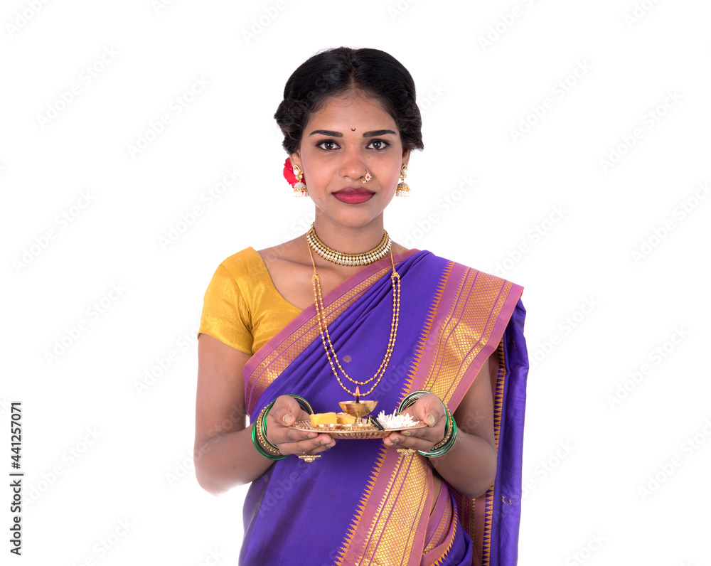 Indian woman performing worship, portrait of a beautiful young lady ...