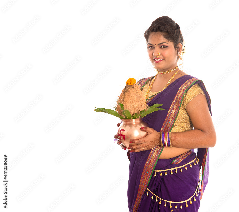 Indian Traditional Woman holding a traditional copper kalash, Indian ...