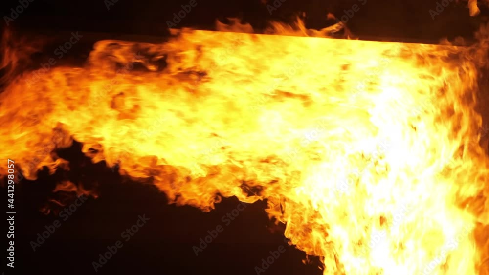 Portrait of firefighter, Fire flames burning strong lpg gas pipe end at ...